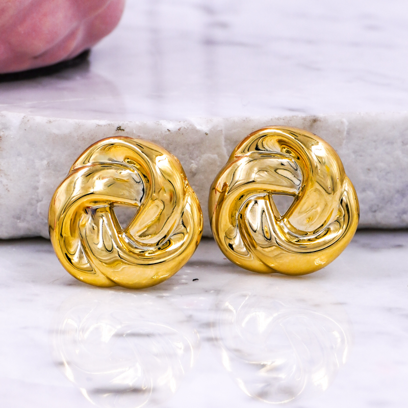 Arete entrelazado dorado x par